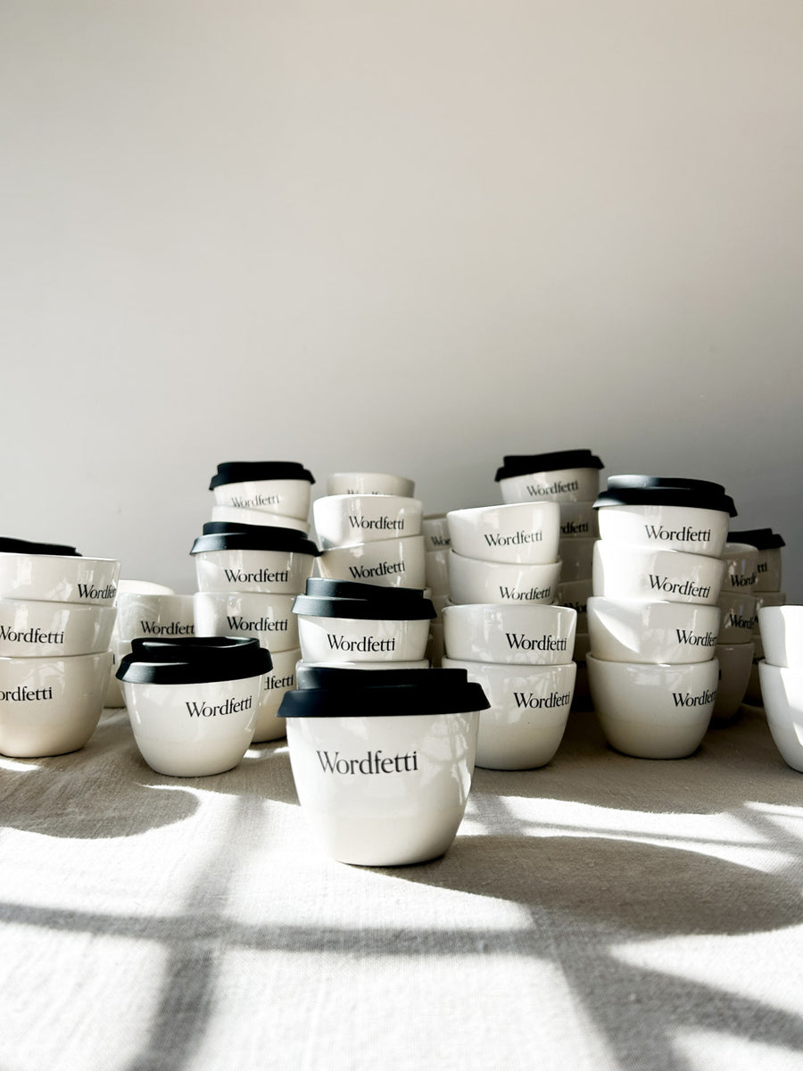 Custom branded logo cups by Kim Wallace Ceramics for Wordfetti
